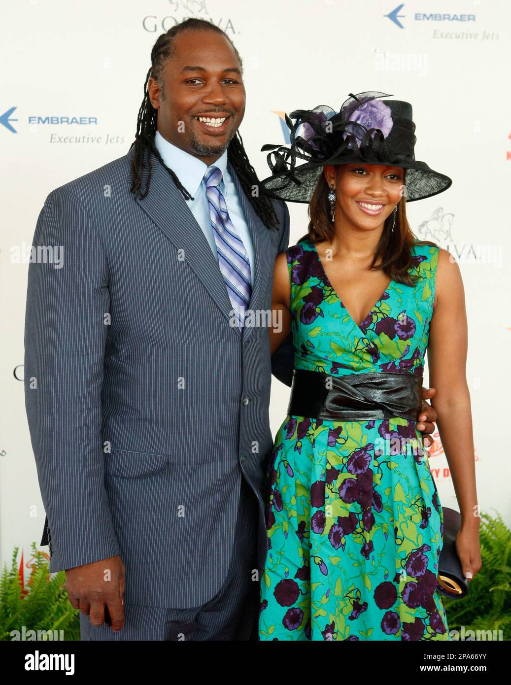 Lennox Lewis and his wife, Violet, arrive for the 134th Kentucky Derby ...