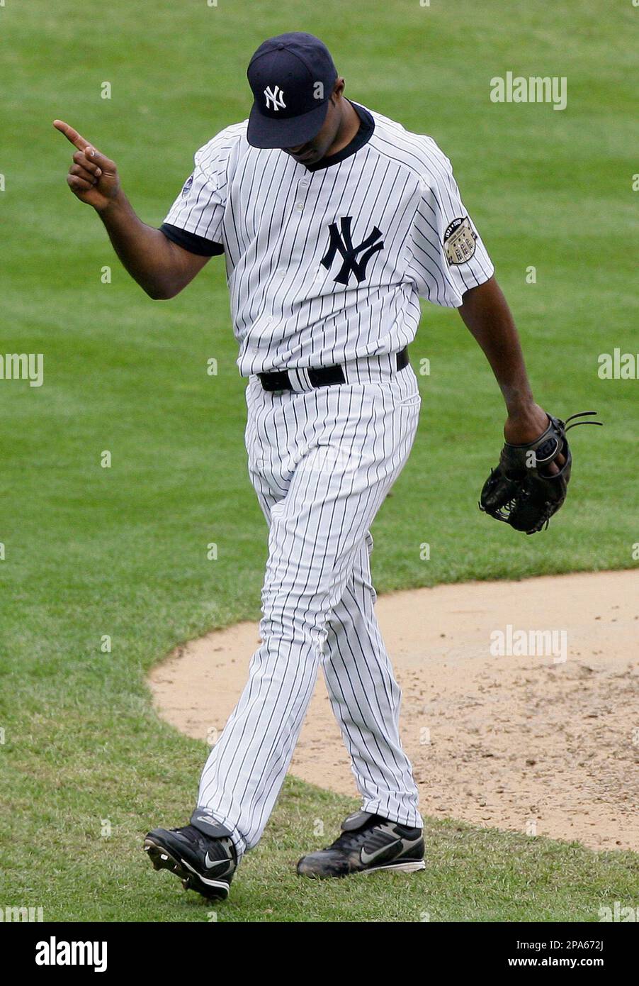New York Yankees pitcher Jose Veras gestures after striking out Seattle ...