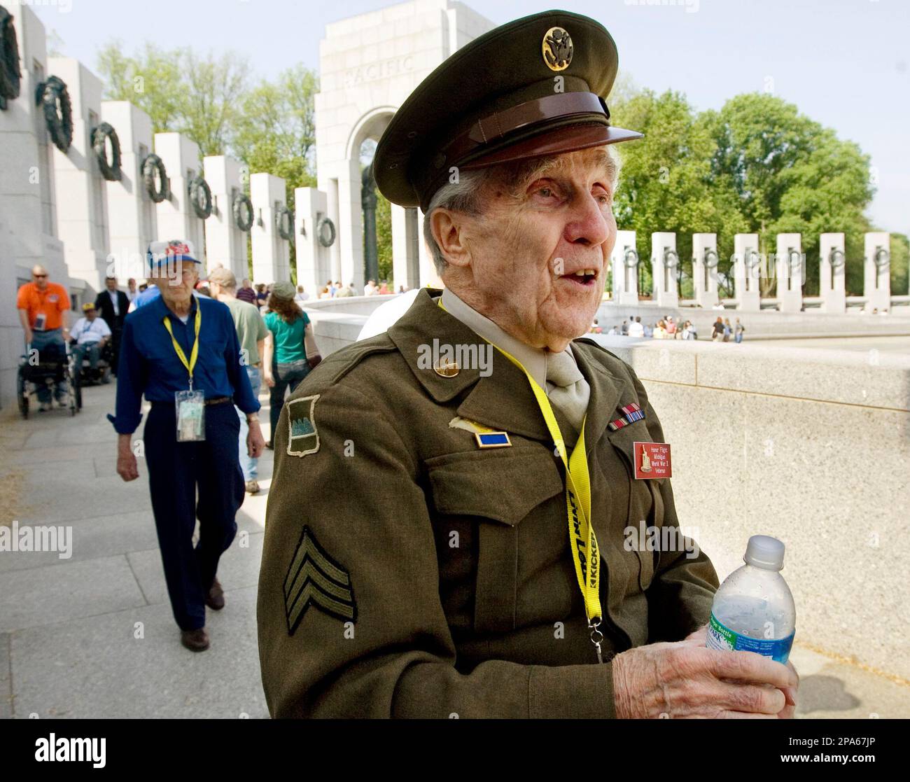 Patrick Stewart, 85, of Inkster, Mich., left, a World War II veteran ...