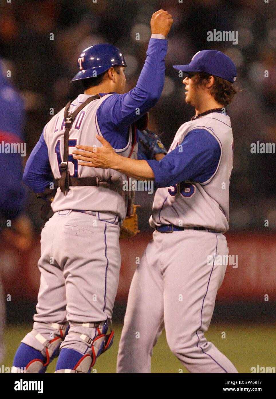 Texas Rangers catcher Gerald Laird, left, congratulates Texas Rangers ...