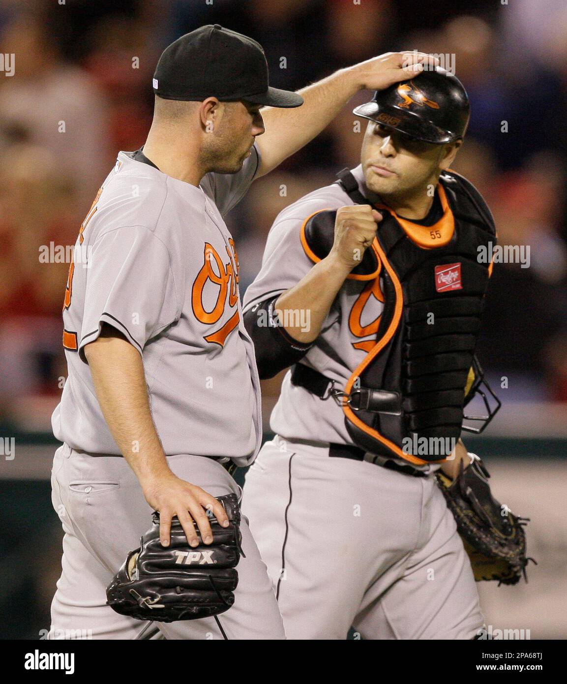 Baltimore Orioles closer George Sherrill, left, celebrates with catcher ...