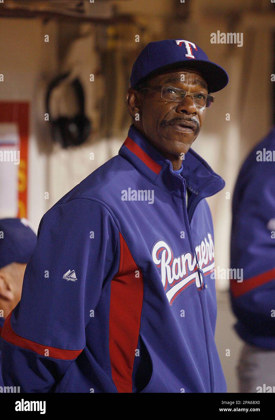 Texas Rangers manager Ron Washington looks at the scoreboard after ...