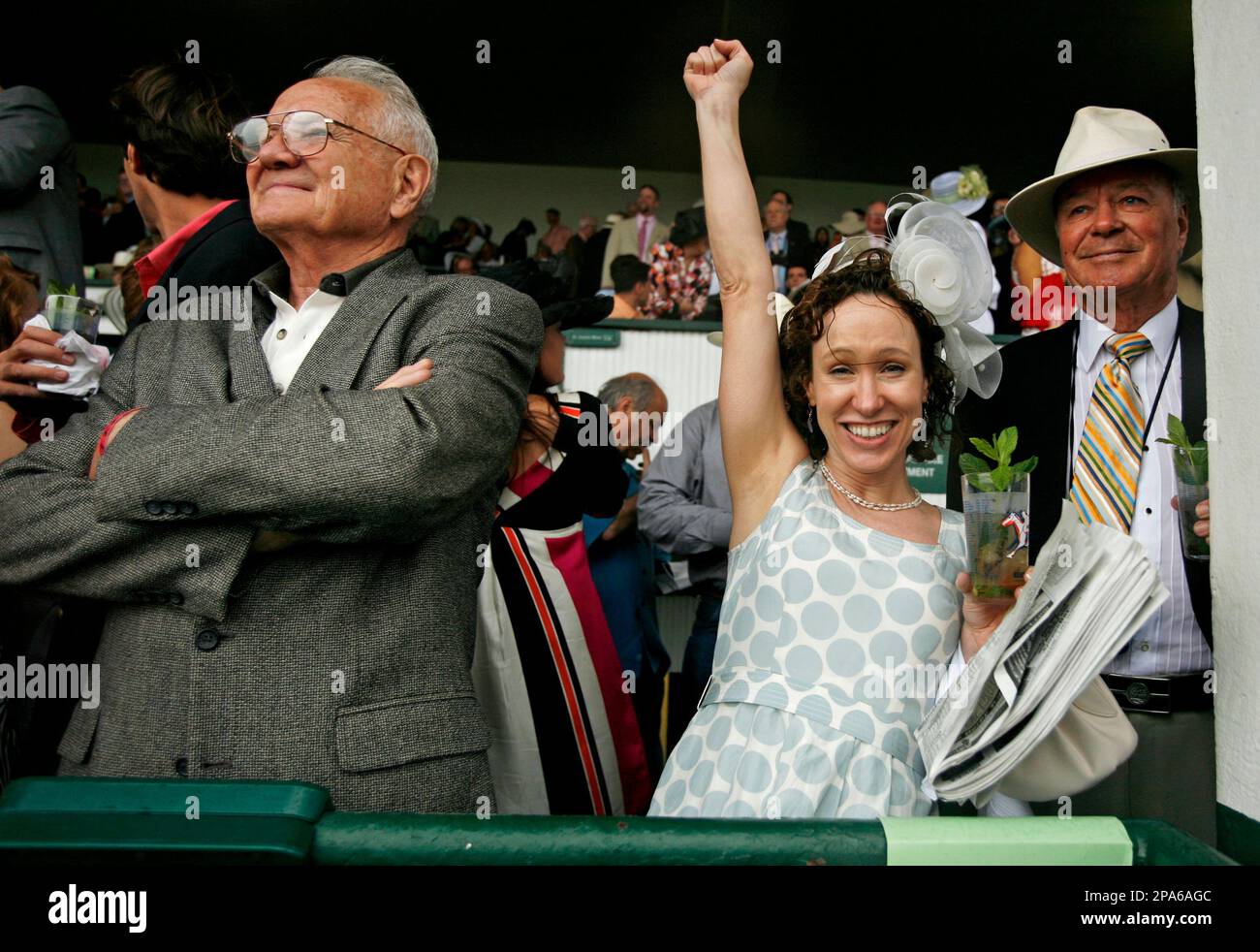 Jennifer Bates, of Dunstable, Mass., celebrates after winning a bet in ...