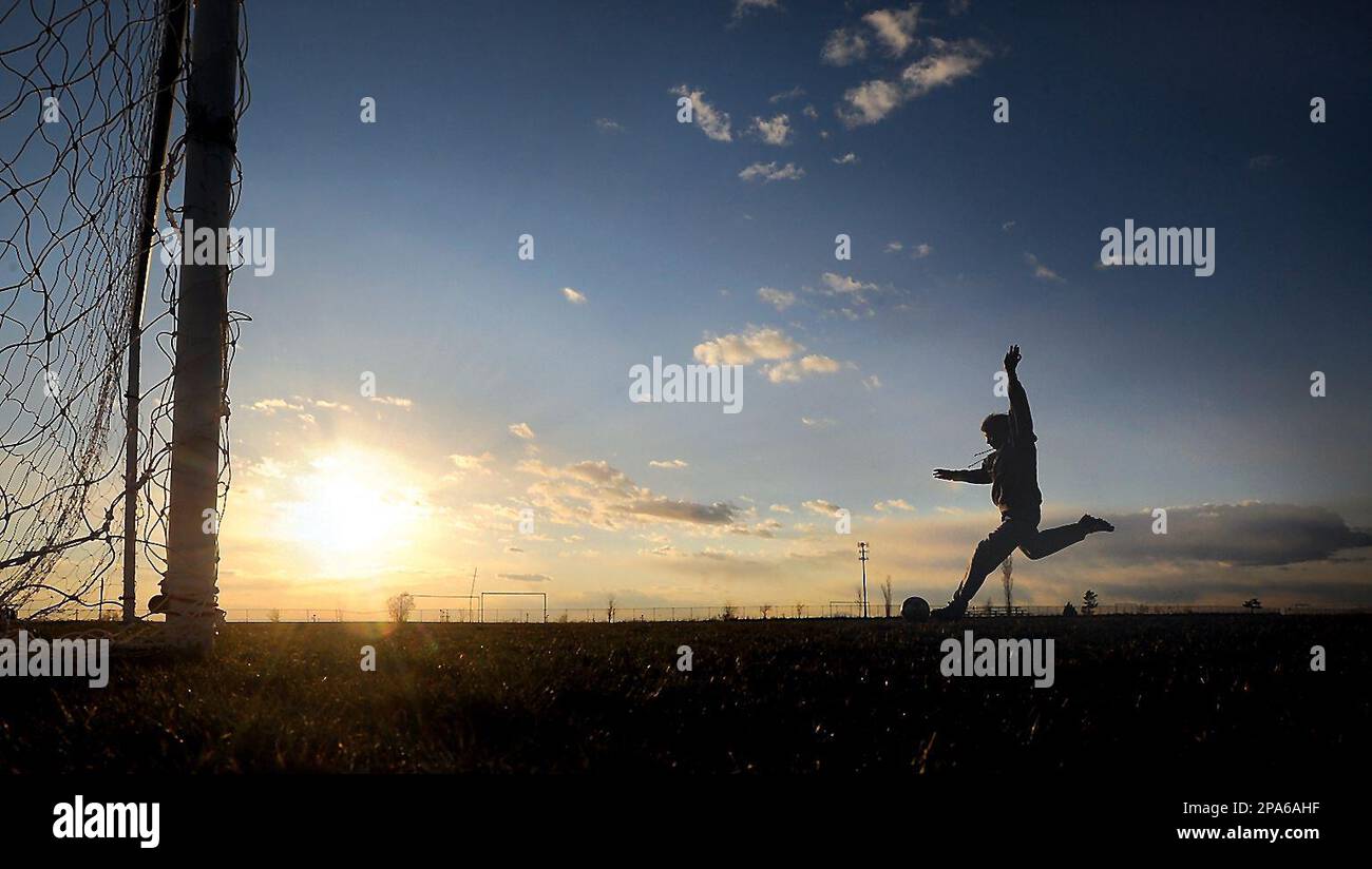 Juli Fisher, 14, gets a few goal shots after finishing practice with ...
