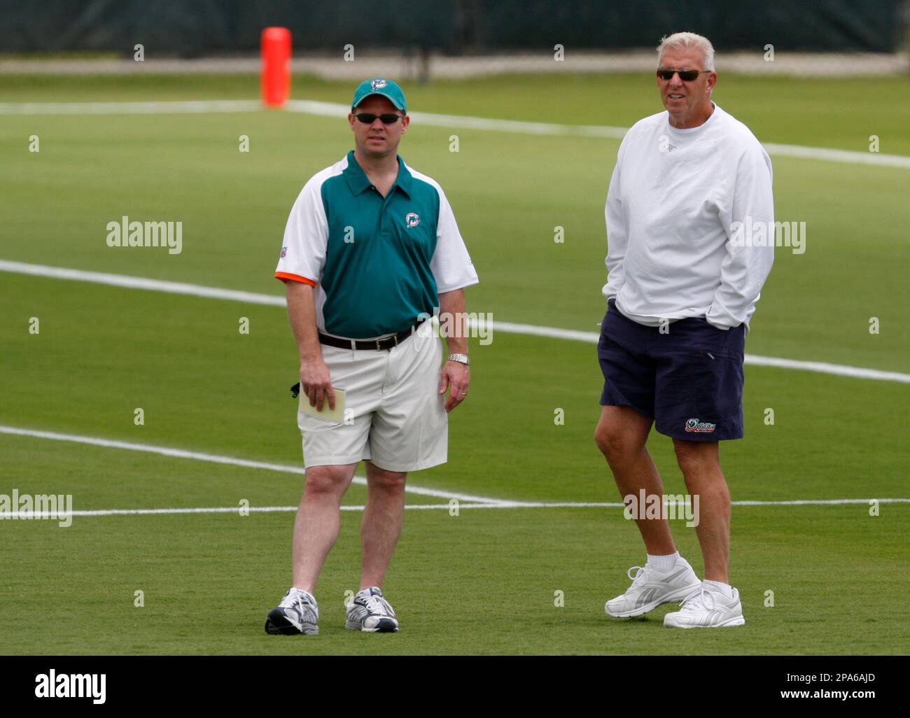 Miami Dolphins general manager Jeff Ireland, left, and Bill Parcells ...