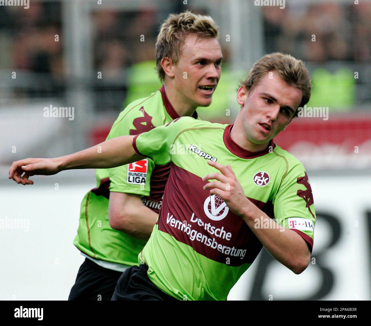 Kaiserslautern's Sebastian Reinert, right, and Christopher Lamprecht ...