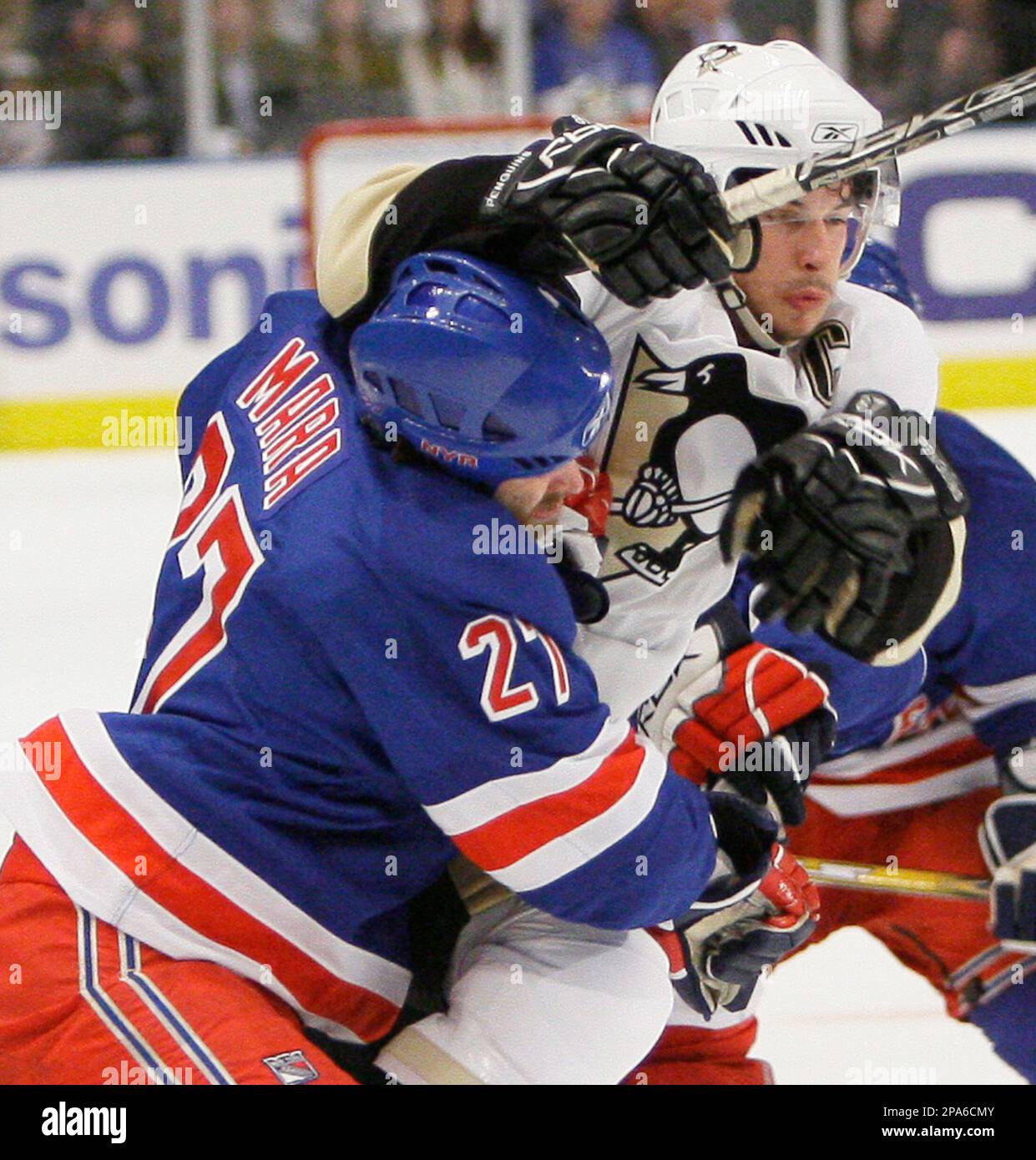 New York Rangers' Paul Mara, left, collides with Pittsburgh Penguins ...