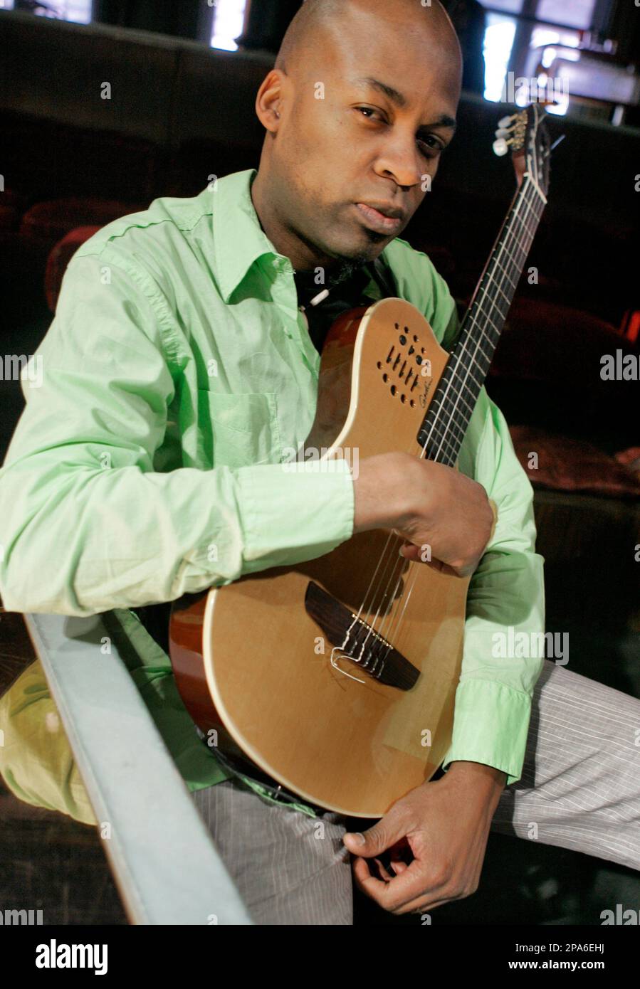 Jazz guitarist Lionel Loueke poses for photos before his sound check at ...