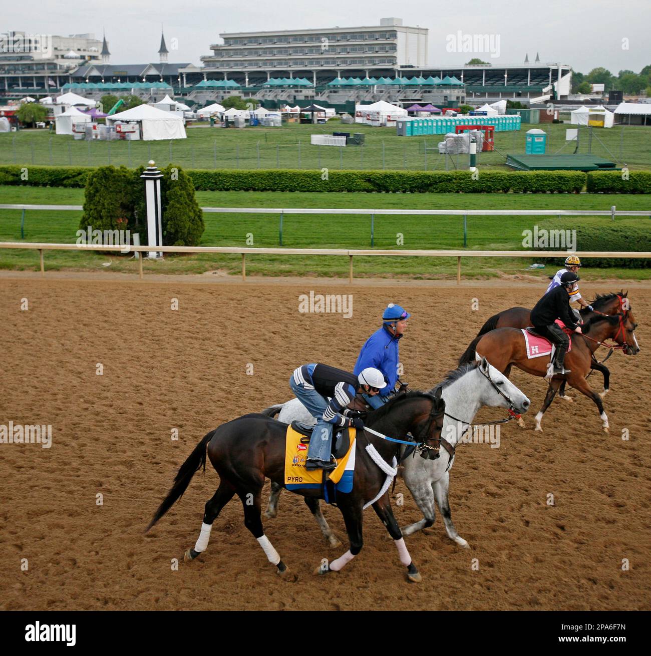 Exercise rider Dominic Terry takes Kentucky Derby hopeful Pyro for a ...