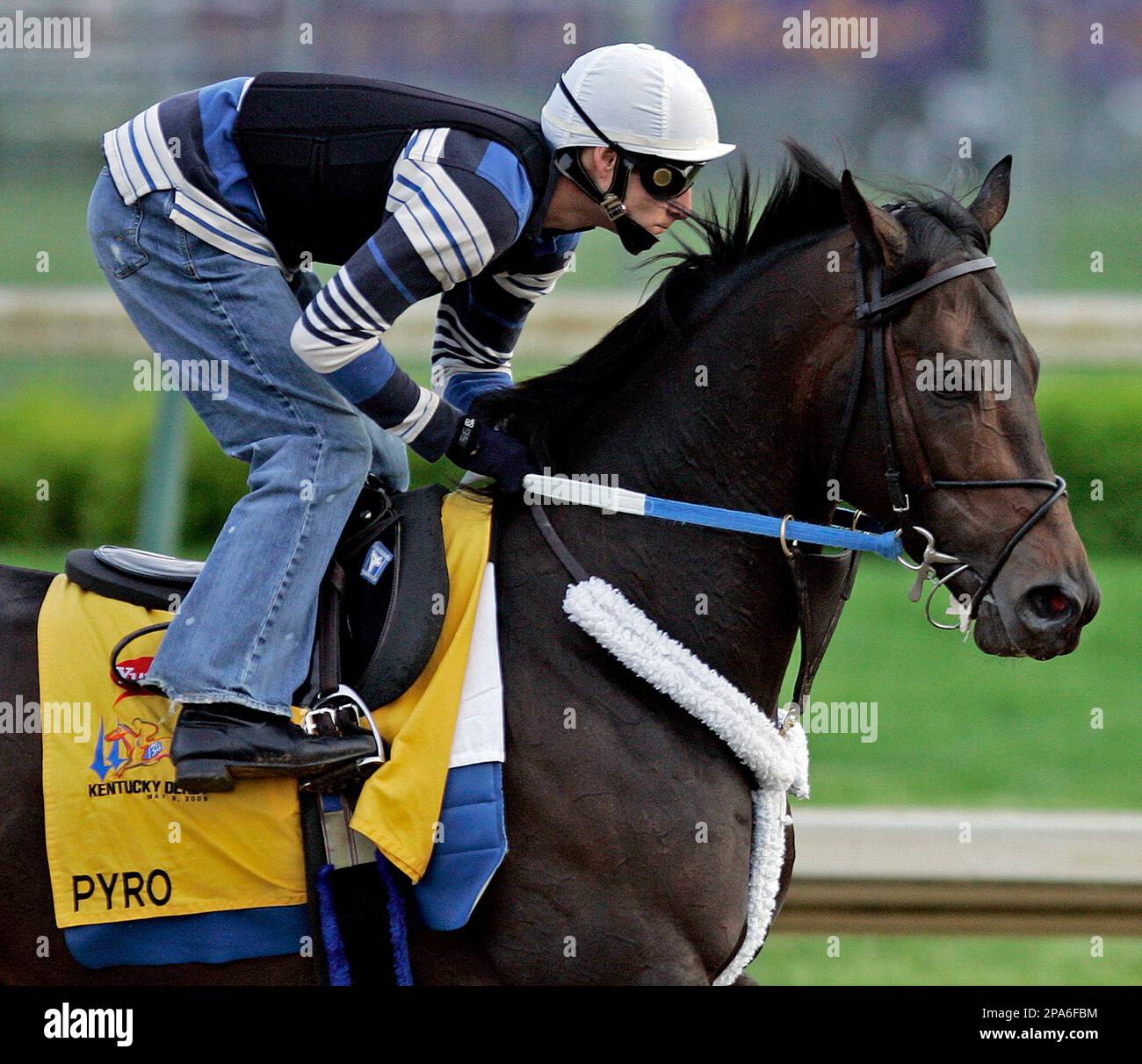 Exercise rider Dominic Terry takes Kentucky Derby hopeful Pyro for a ...