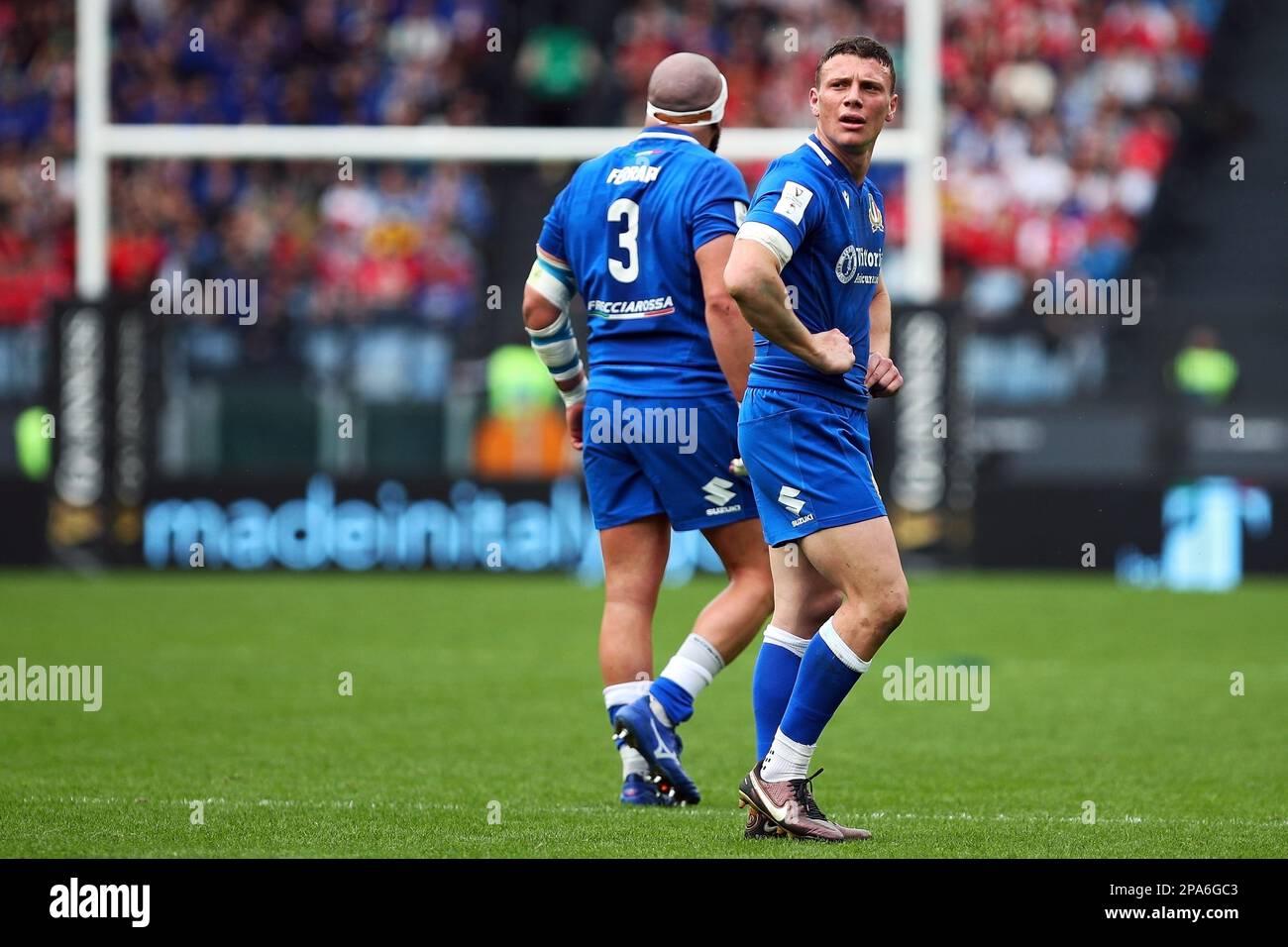 Simone Ferrari (L) and Paolo Garbisi (R) of Italy react during the Six ...