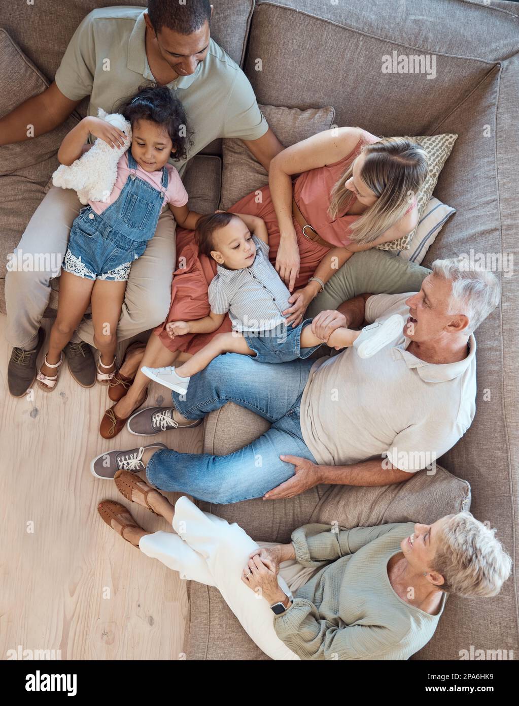 Family relax, generations and love in home with happy parents ...