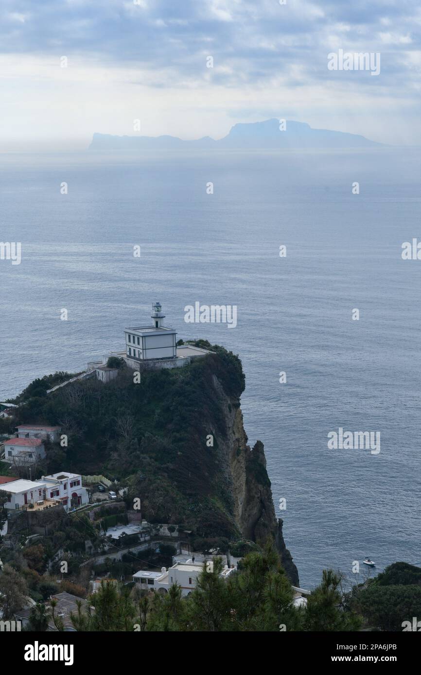 The lighthouse of Capo Miseno and, in the background, the island of ...