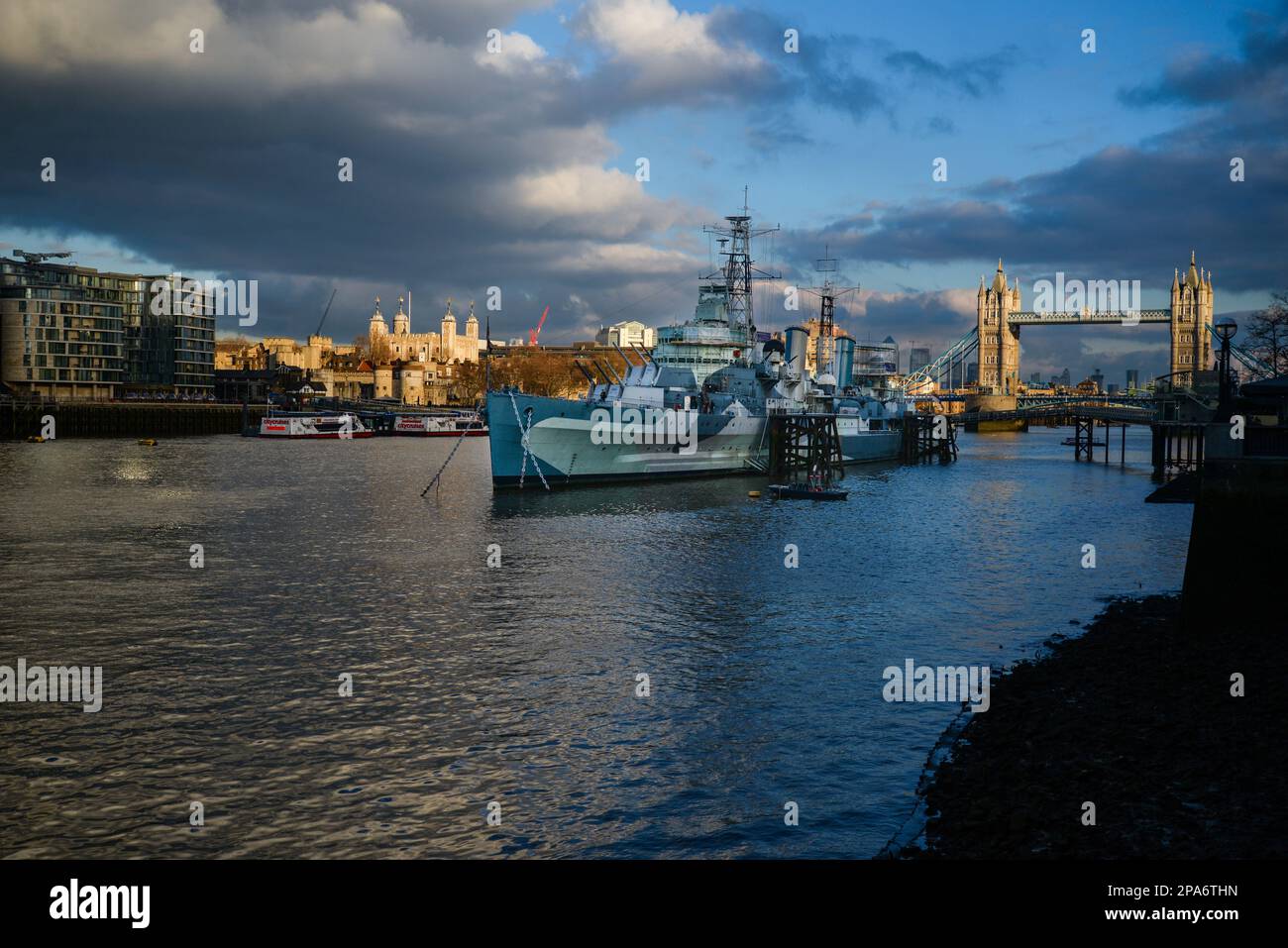 2018 view of the Pool of London with HMS Belfast, The Tower of London ...