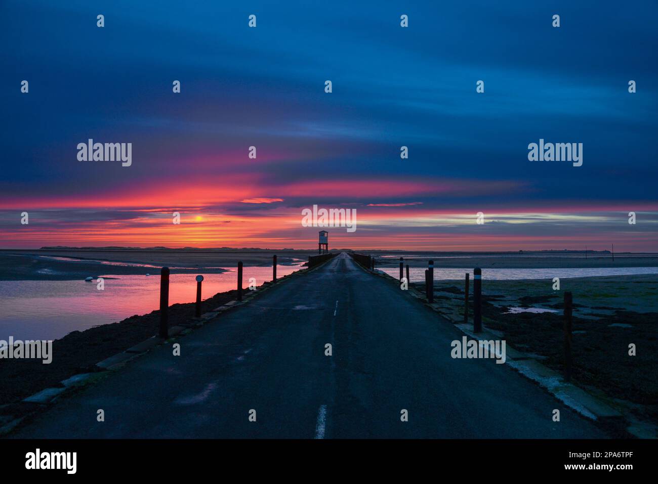 The tidal causeway with its refuge box, to Holy Island, Northumberland ...