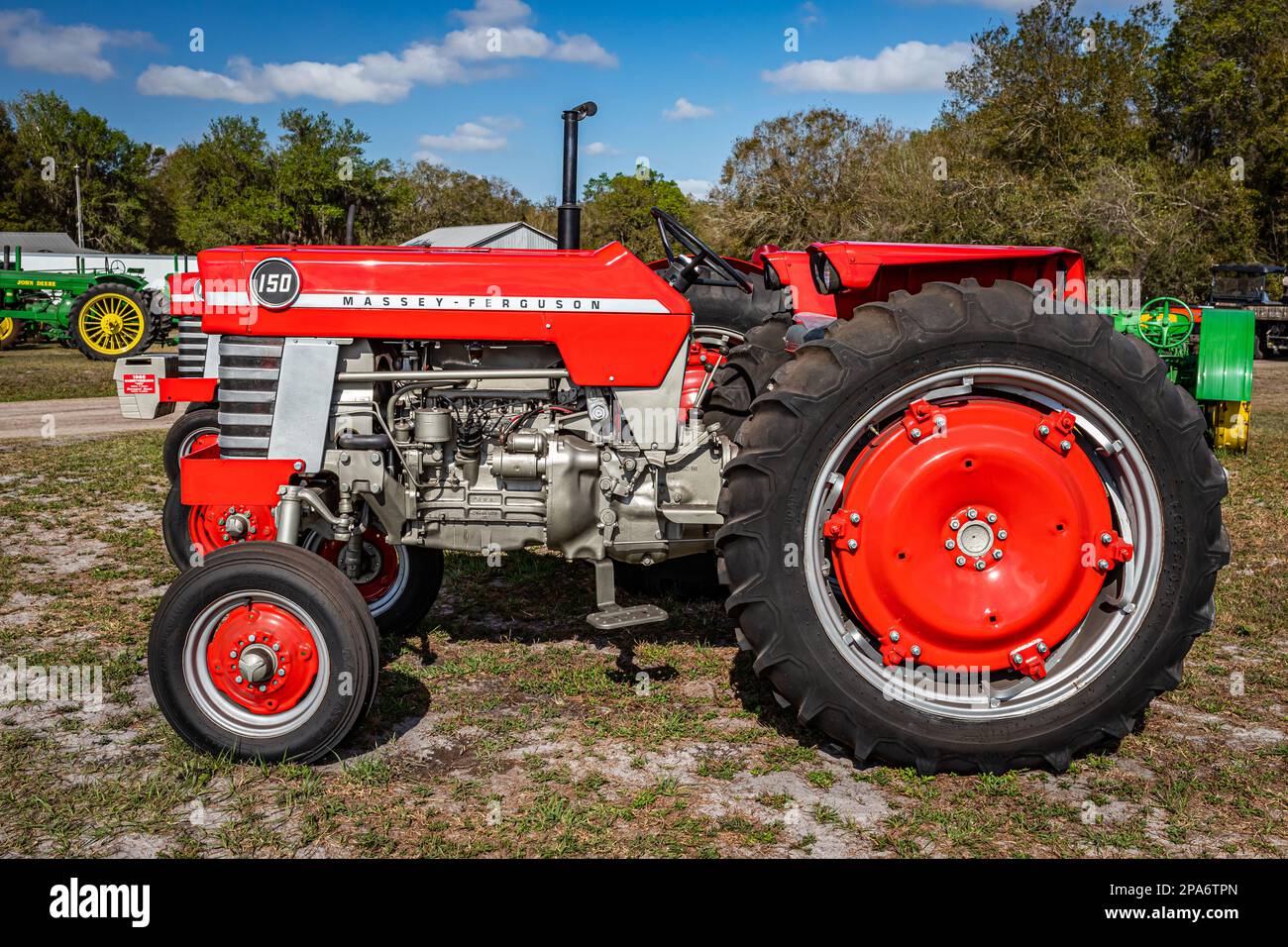 Fort Meade, FL - February 26, 2022: High perspective side view of a 1968 Massey Ferguson 150 at ...