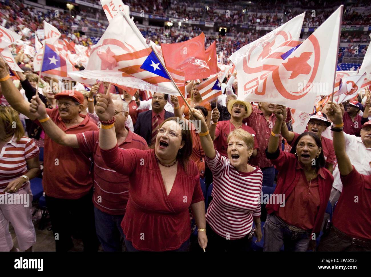 Members of Puerto Rico's Gov. Anibal Acevedo Vila's political party ...