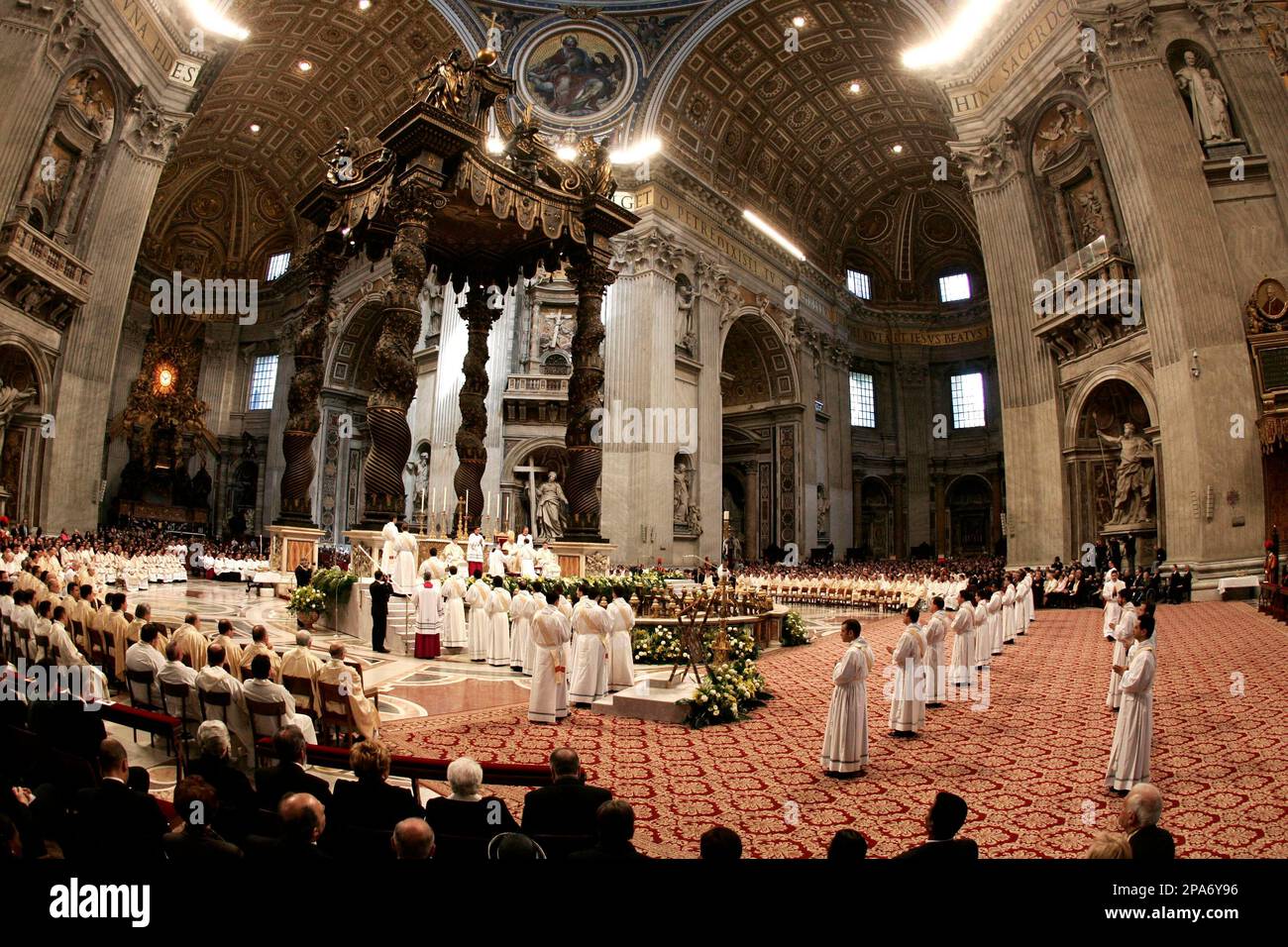 New ordained priests pray during a ceremony lead by Pope Benedict XVI ...