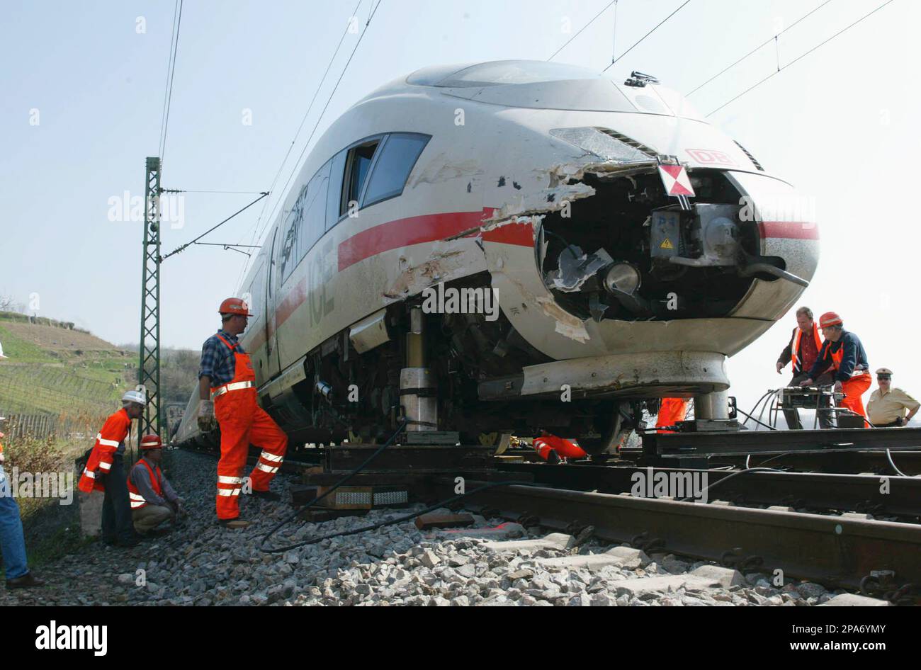 ** FILE ** in this April 1, 2004 file photo workers secure the derailed ...