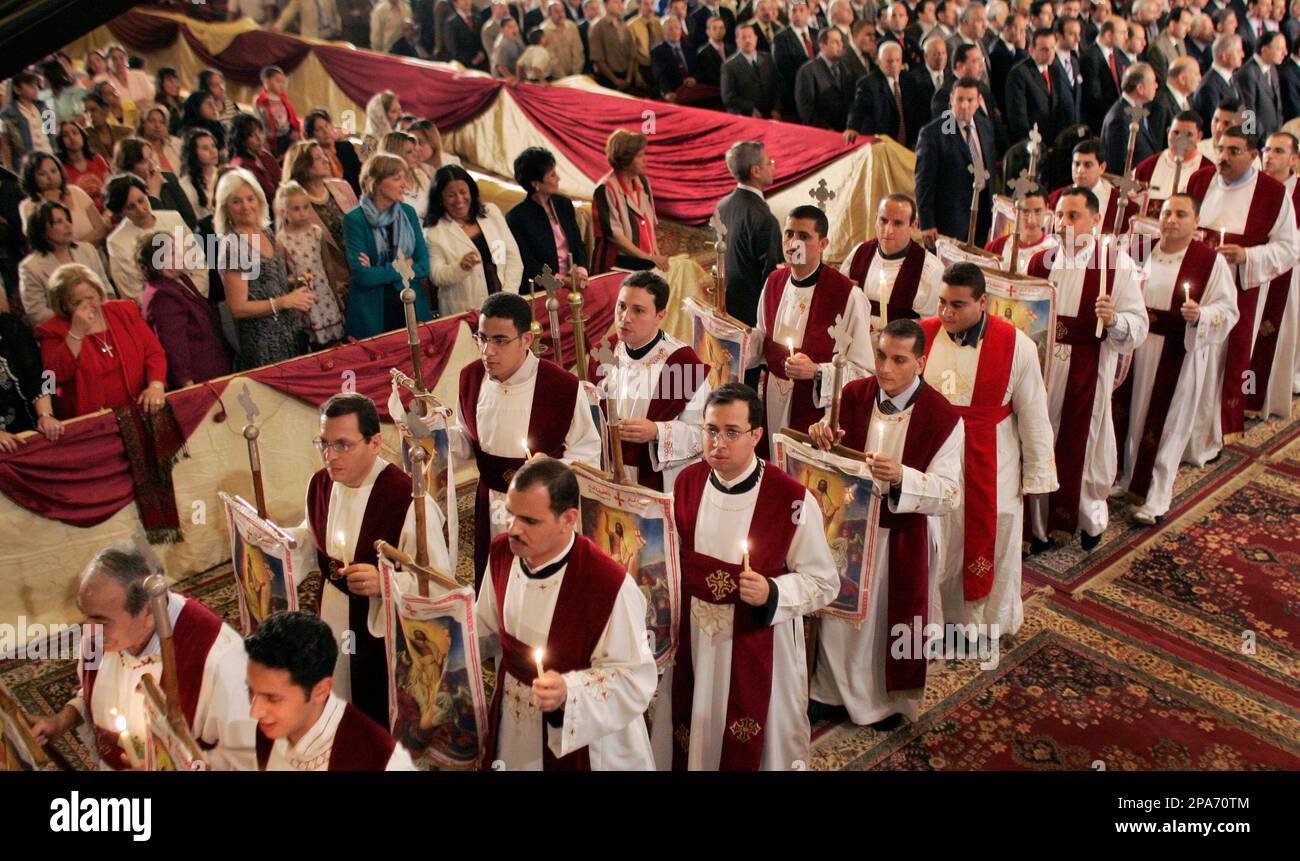 Coptic Christians take part in a midnight service to celebrate Christ's ...