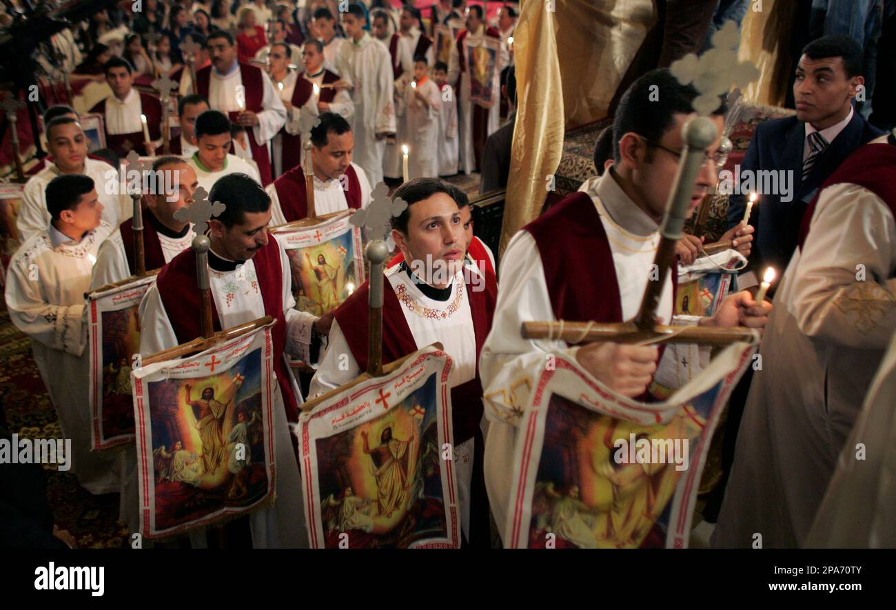 Coptic Christians take part in a midnight service to celebrate Christ's ...