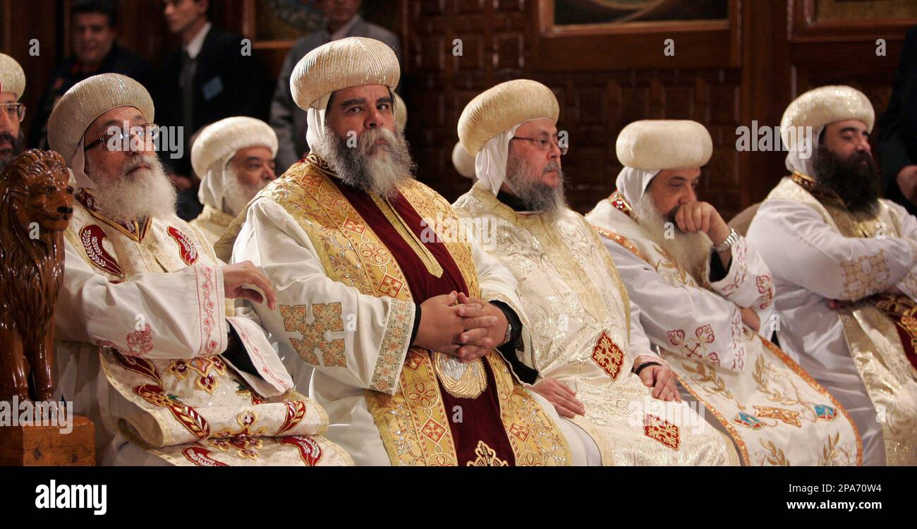 Coptic Christian priests take part in a midnight service to celebrate ...