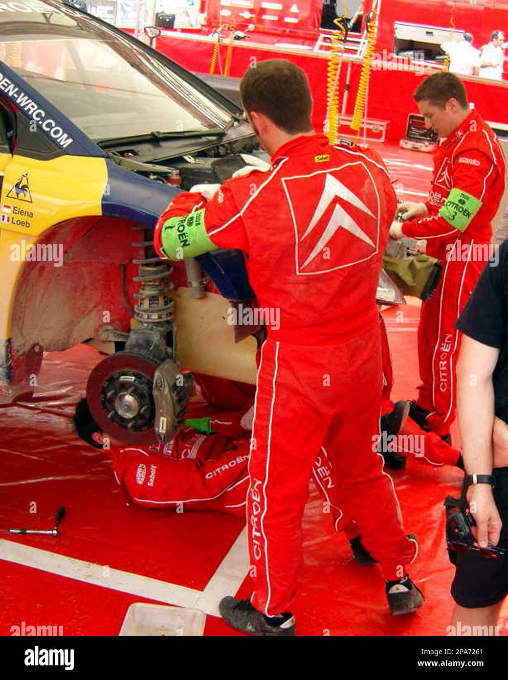 Citroen mechanics repair the car of WRC driver Sebastian Loeb of France ...