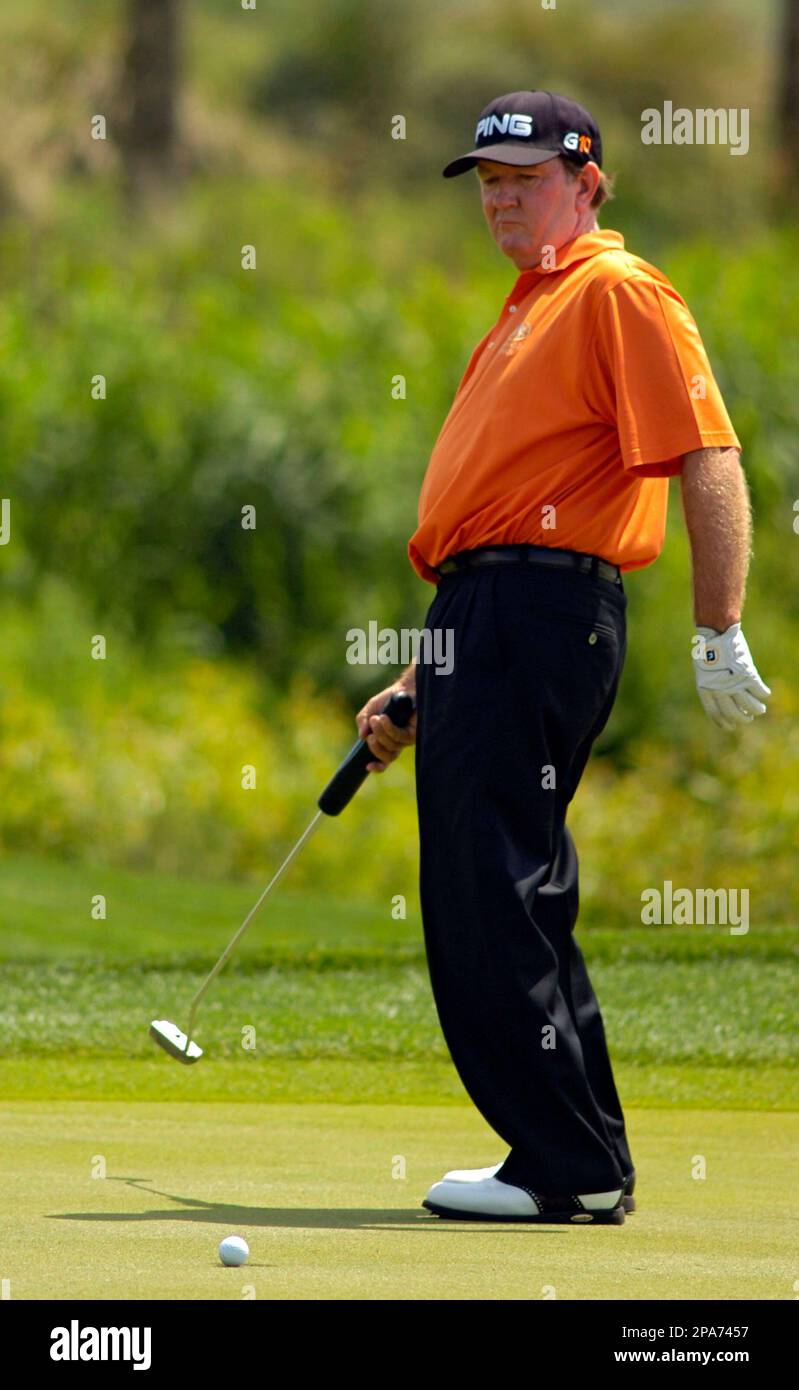 Bob Gilder reacts after missing a birdied the 17th hole during the ...