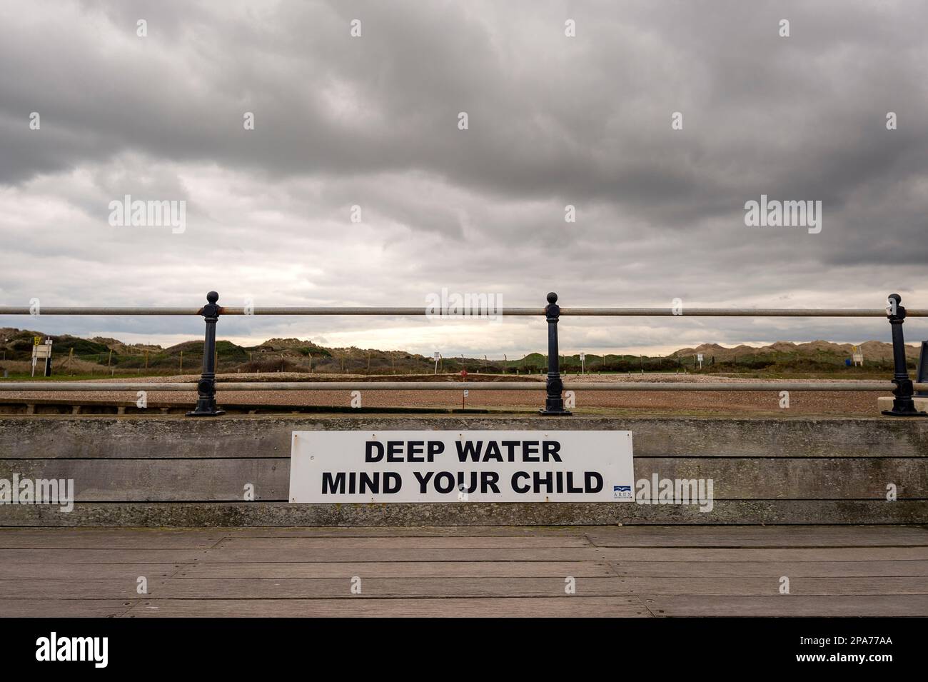 Deep water mind your child warning sign on the seafront at ...