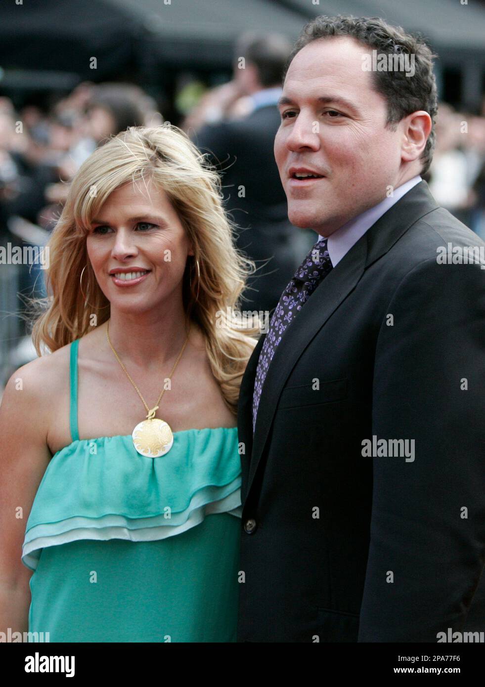 Director Jon Favreau, right, and his wife Joya arrive for the British ...