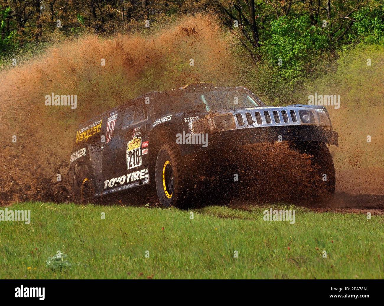 Robby Gordon of the US with his compatriot co-driver Andy Grider drives ...