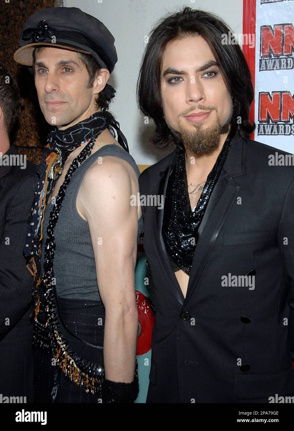 Singer Perry Farrell, left, and musician Dave Navarro pose on the press ...