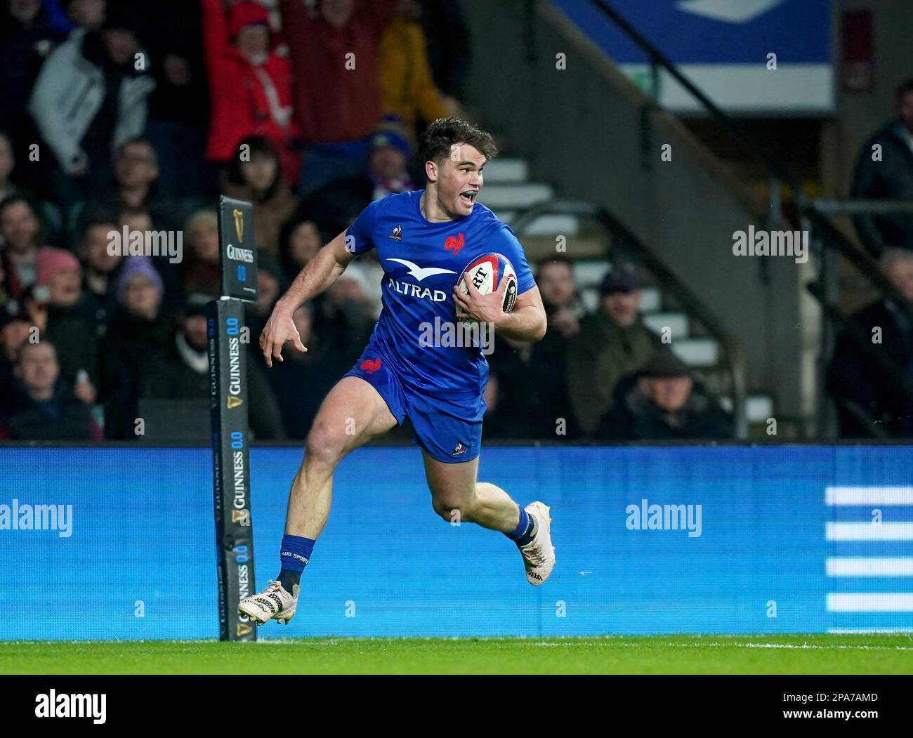 France's Damian Penaud runs through to score his sides sixth try of the ...