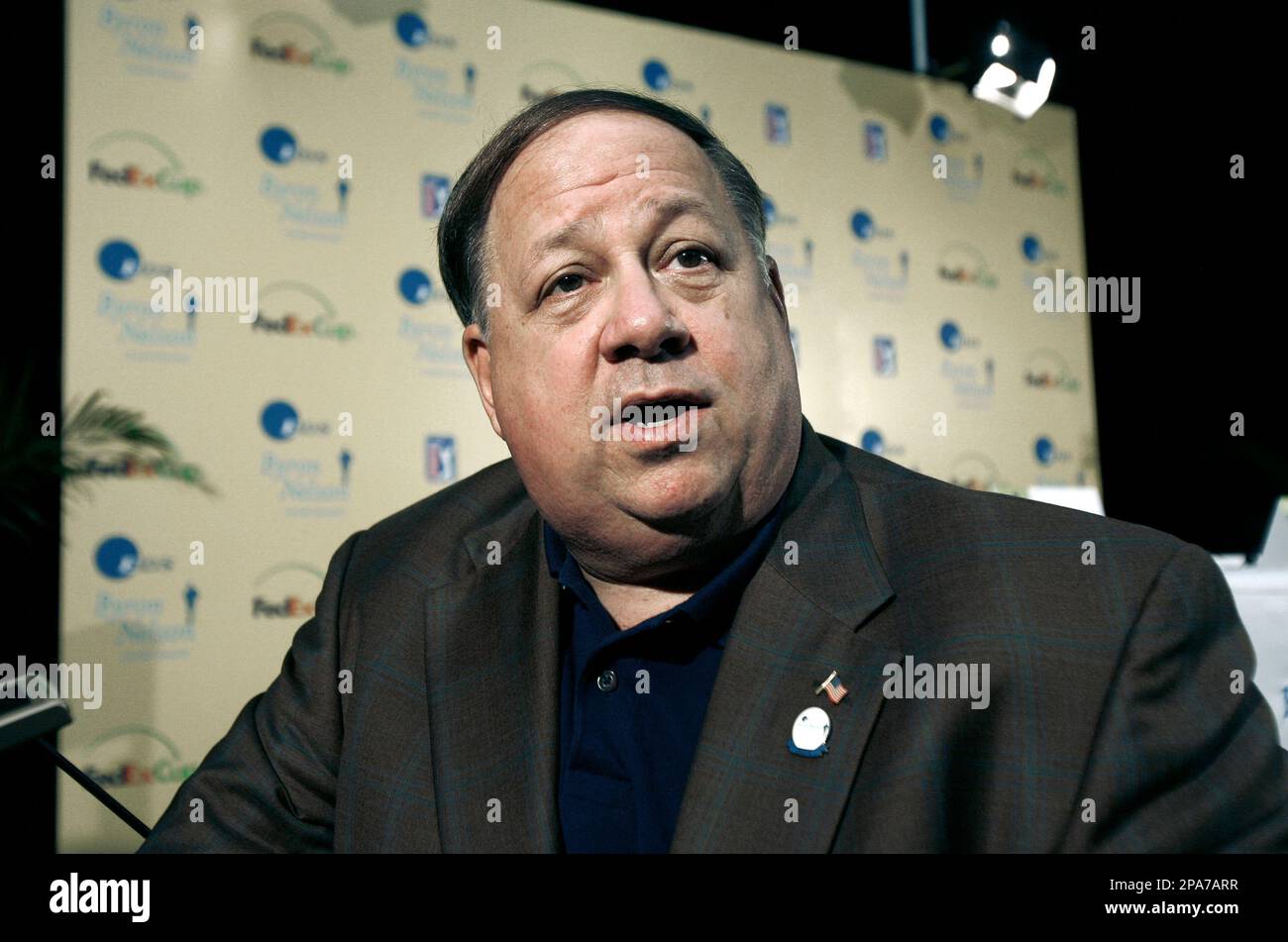 Ron Rittenmeyer, President and CEO of EDS, speaks to reporters after ...