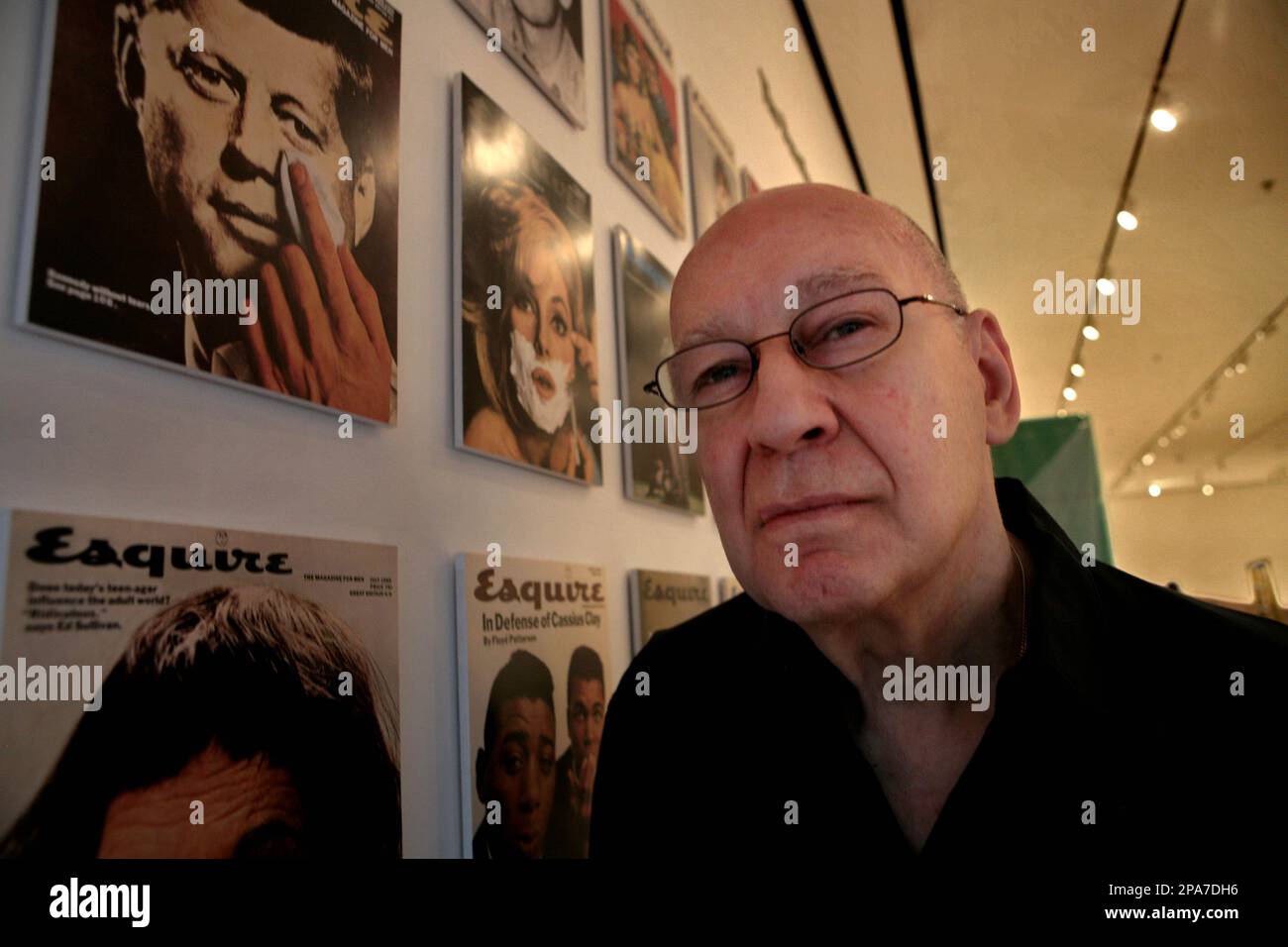 Artist George Lois poses next to his art work at the New York Museum of ...
