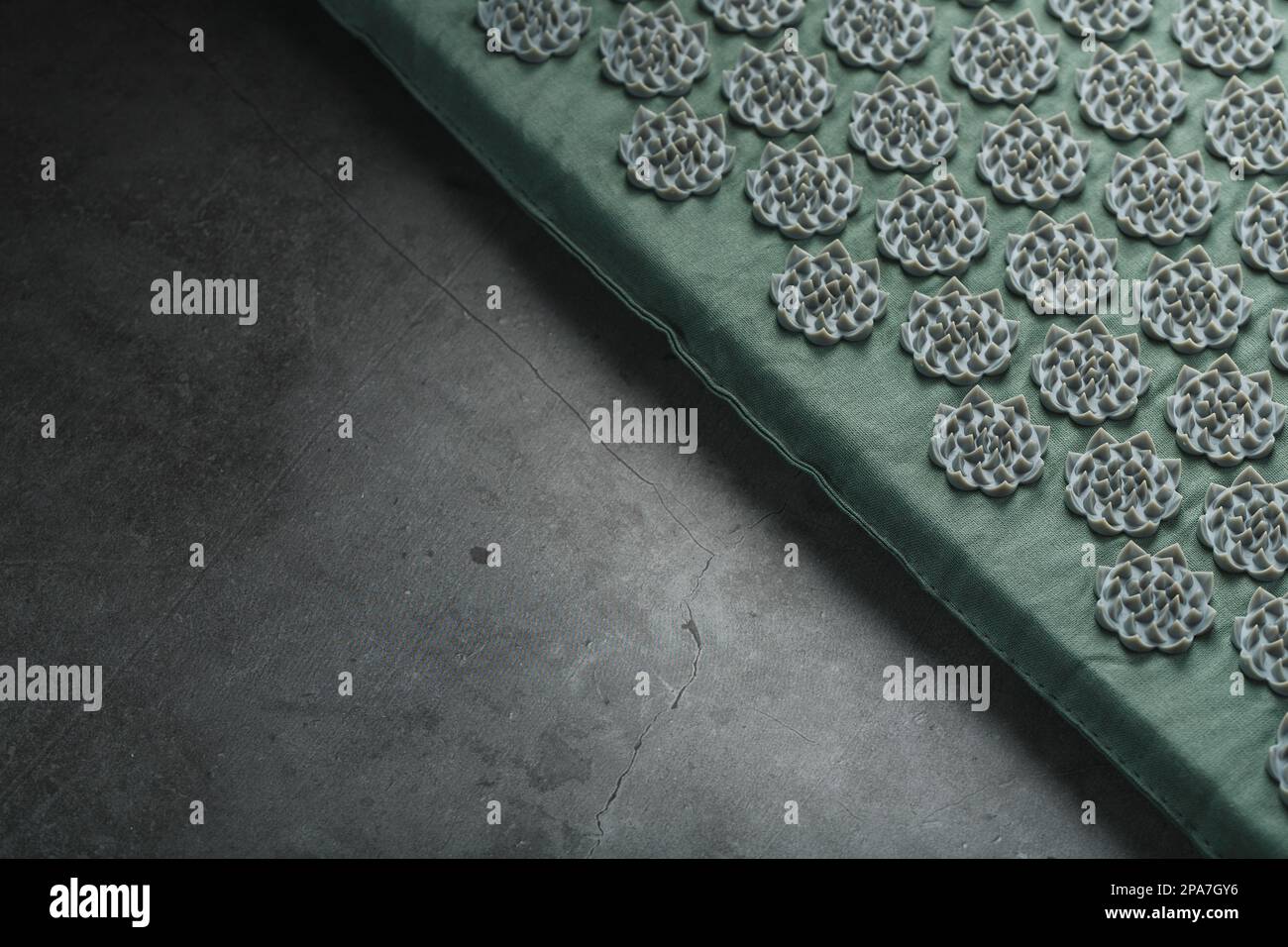 Massage mat with prickly spikes Kuznetsov applicator top view. On a ...