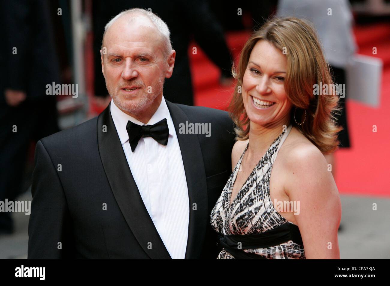 New Zealand's actor Alan Dale, left, and his wife Tracey arrive for the ...