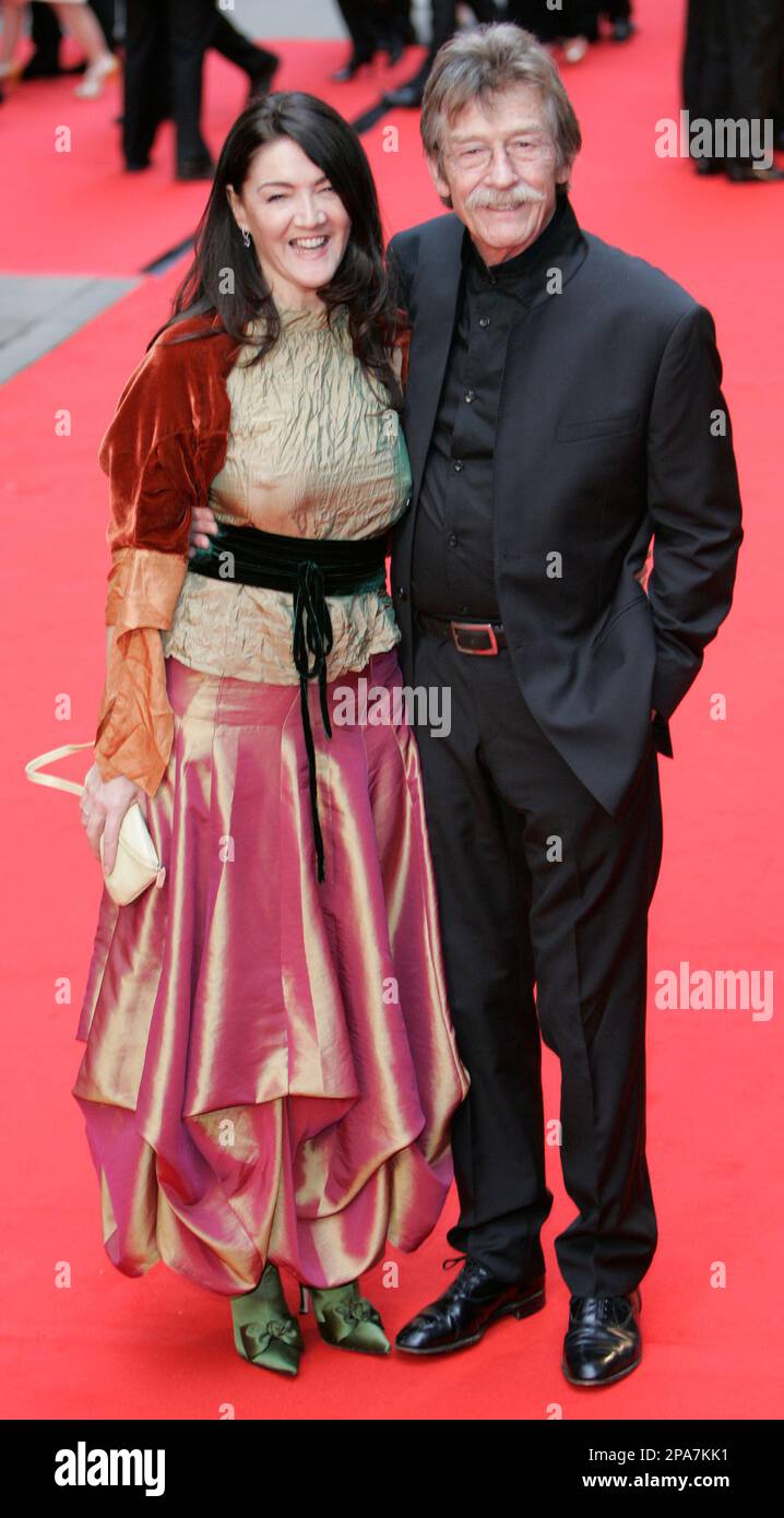 British actor John Hurt, right, and his wife Ann Rees Meyers arrive for ...