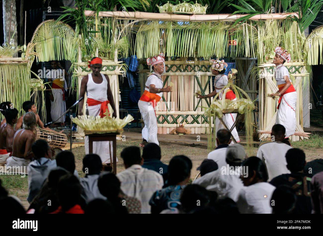 A traditional Sri Lankan dancer performs during "Daha Ata Sanniya ...