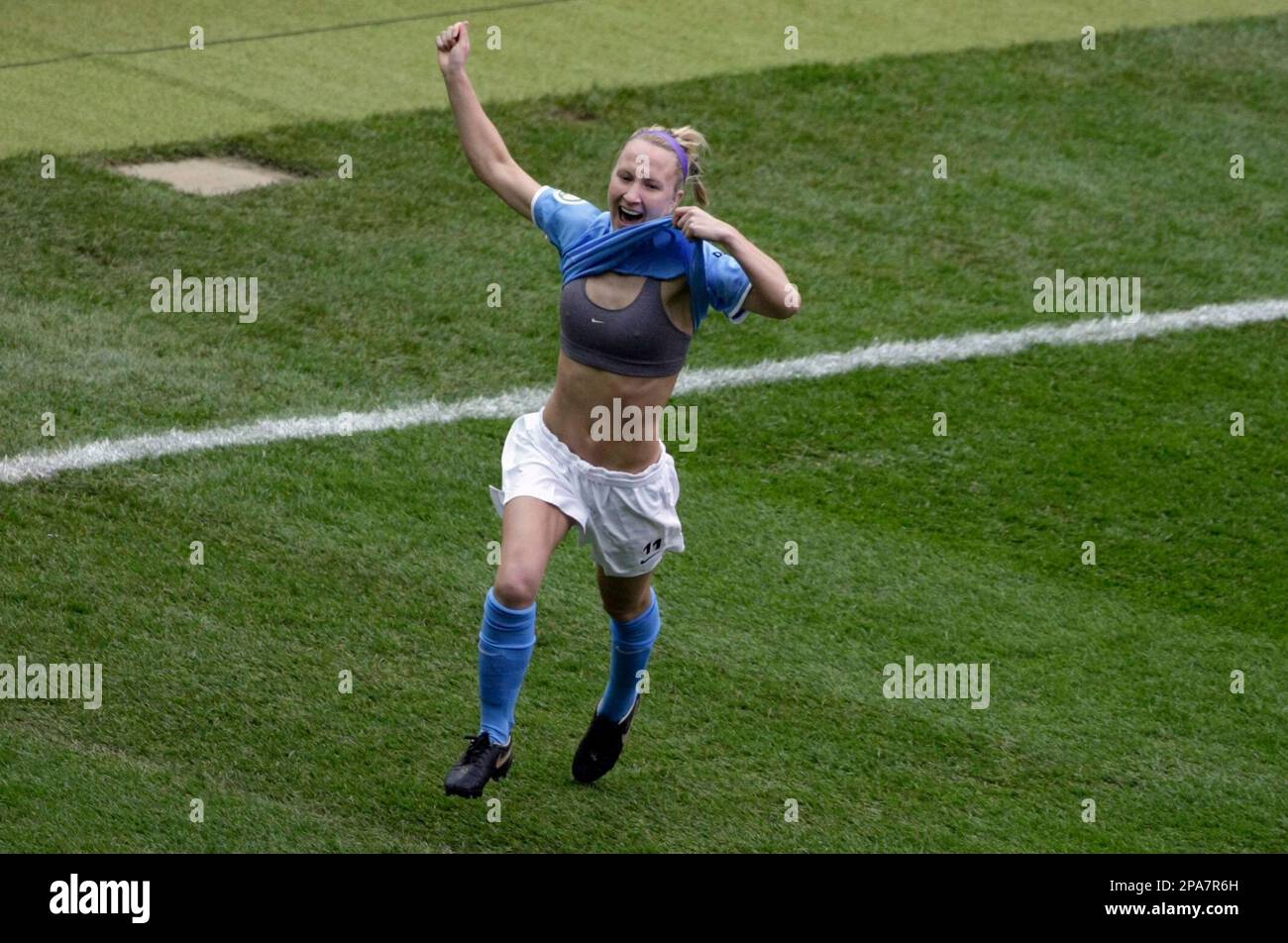 Saarbruecken's Natalie Budge celebrates her first goal and lifts her ...
