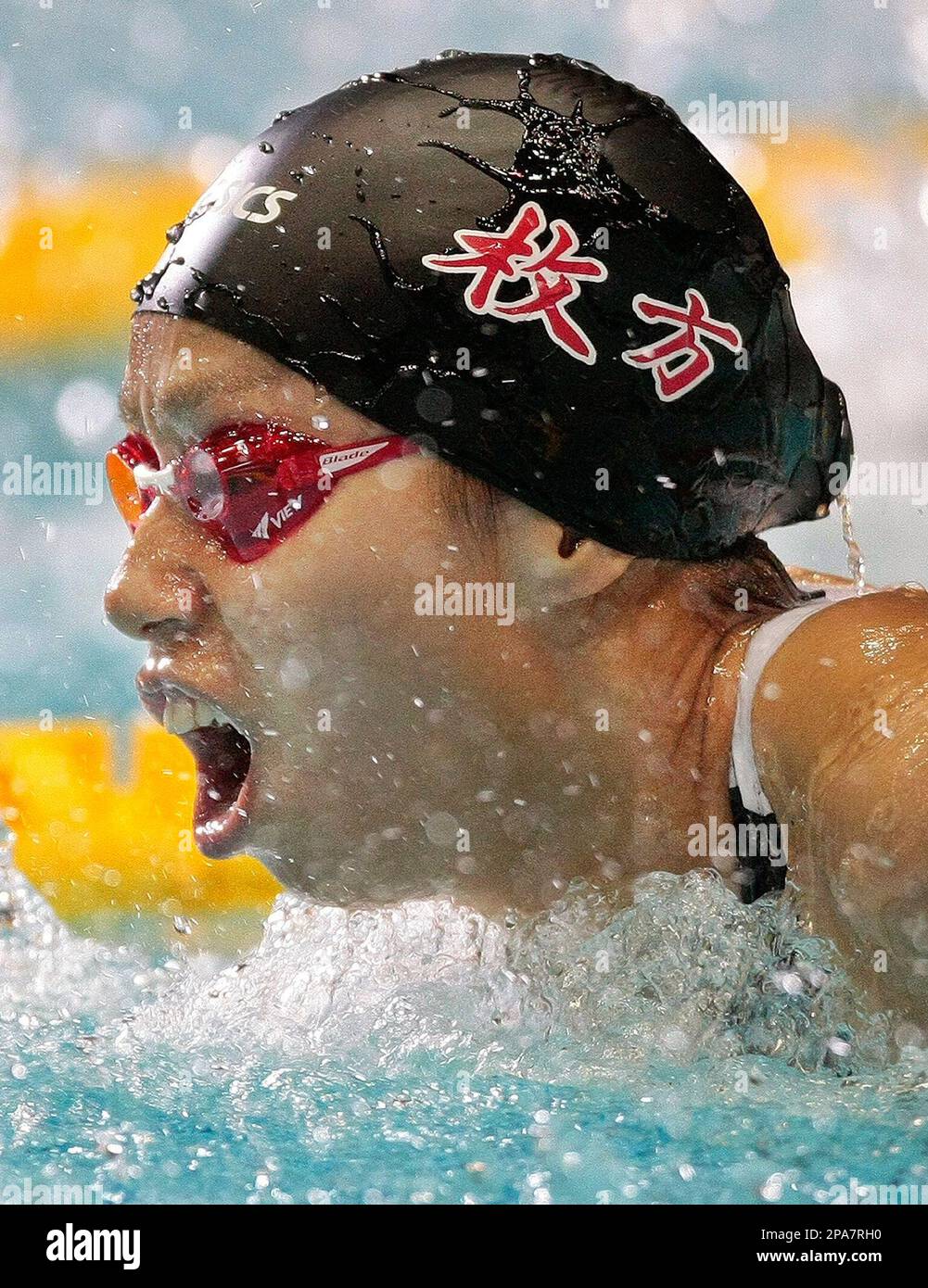 Athens Olympic bronze medalist Yuko Nakanishi of Japan swims on her way ...