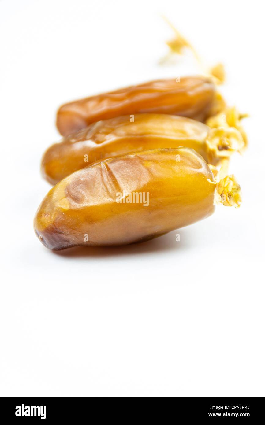 Close-up of Algerian royal dates on a white background. Ramadan concept ...