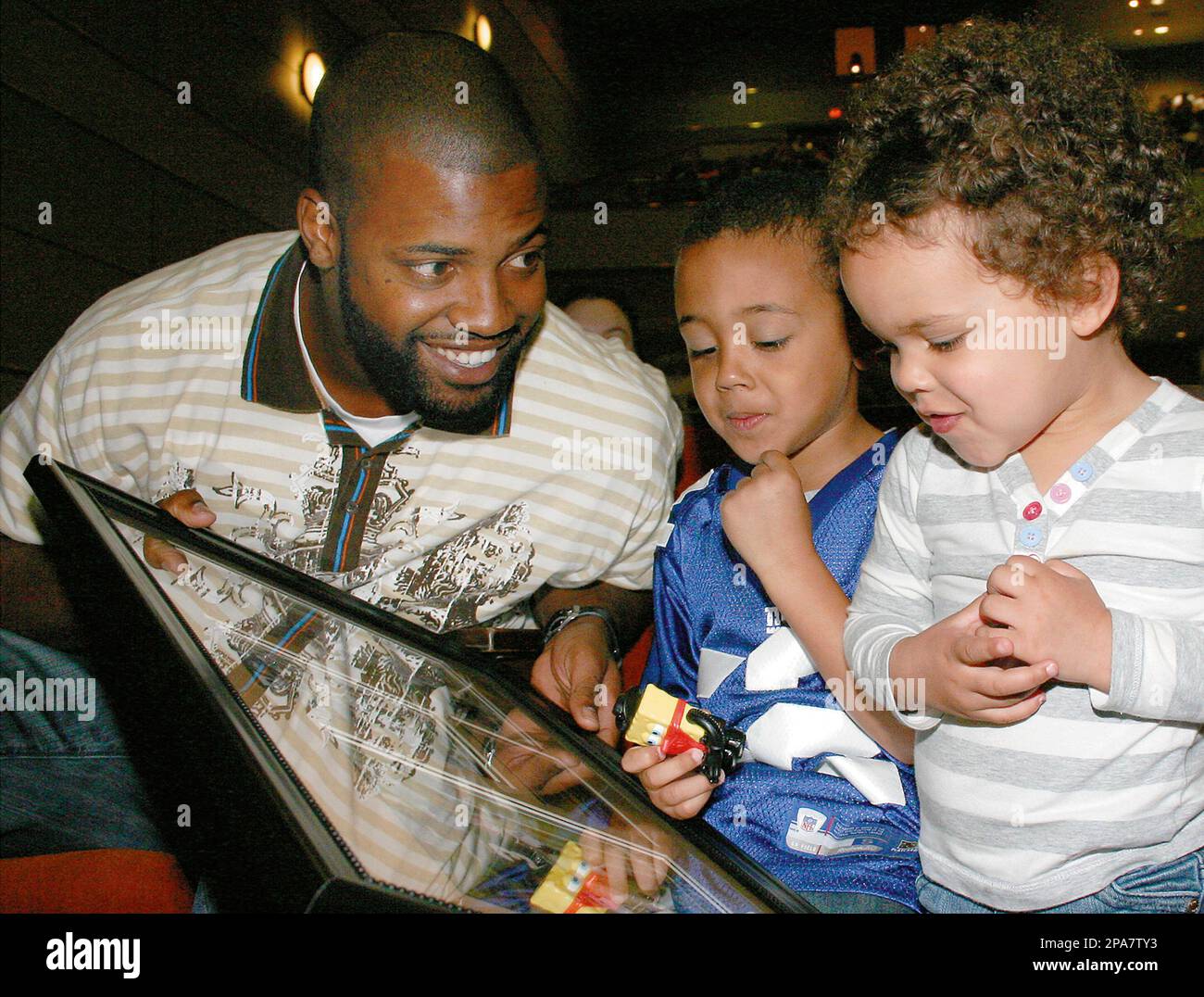 Former Harding University football player Torrance "Tank" Daniels shows ...