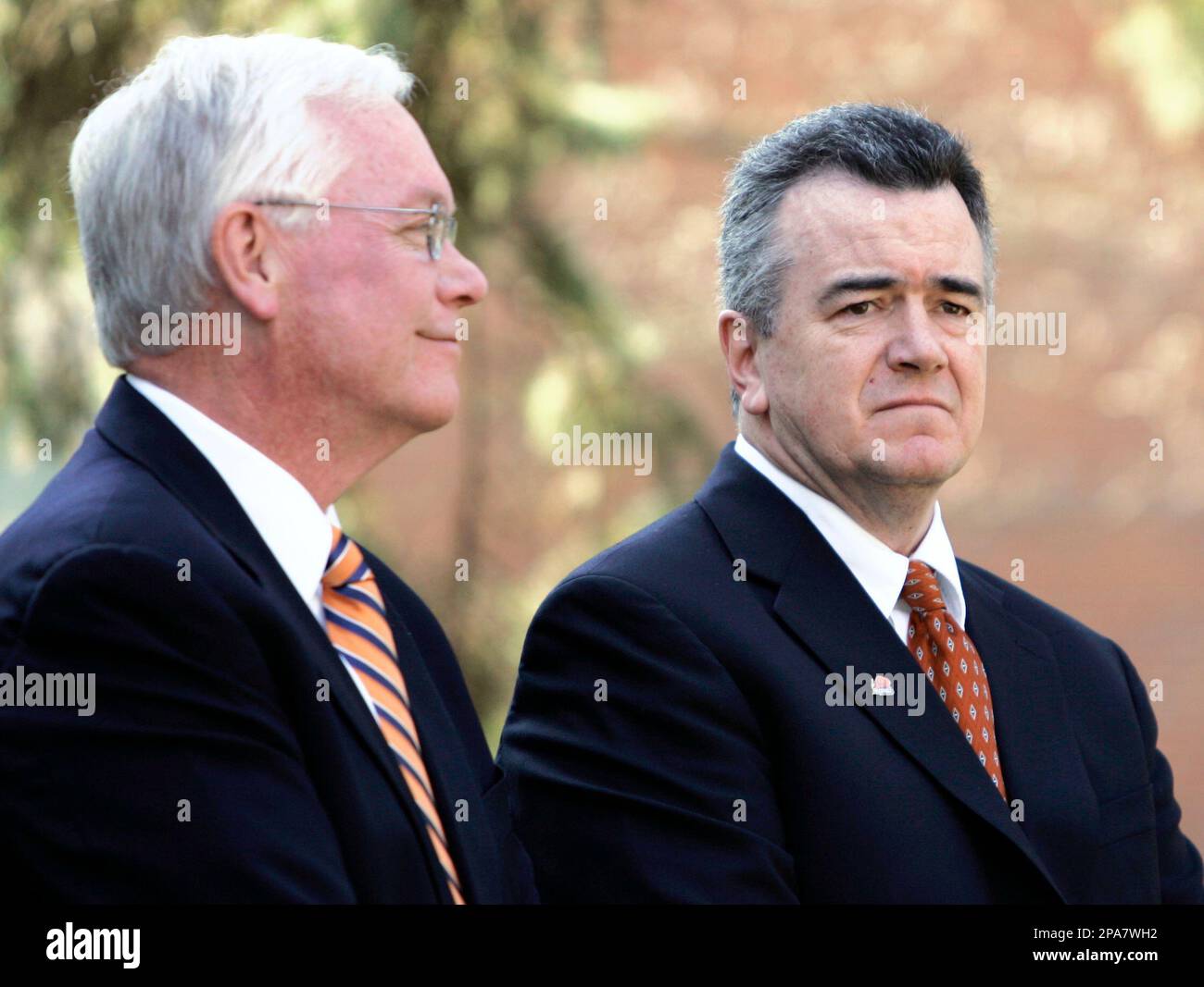Bucknell men's basketball coach Pat Flannery, right, stands by with ...