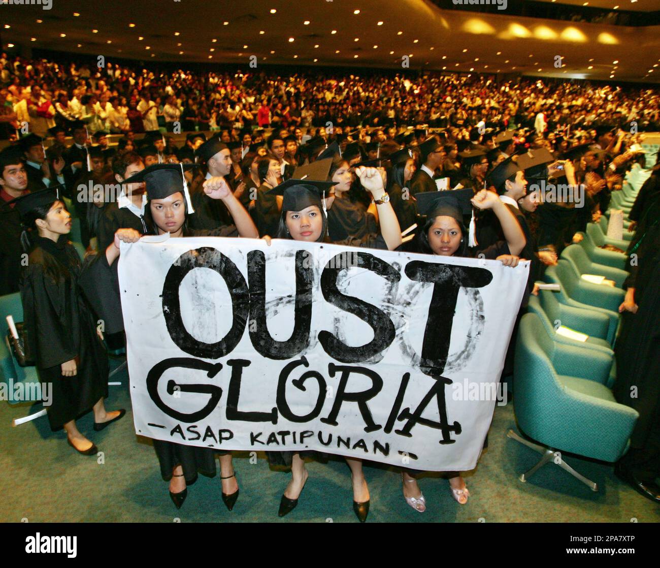 A group of new graduates from the University of the Philippines, the ...