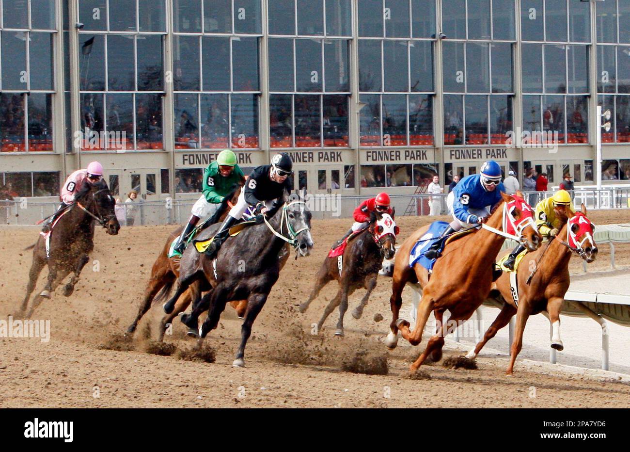 ** ADVANCE FOR WEEKEND EDITIONS, APRIL 19-21 ** Horses round the track ...