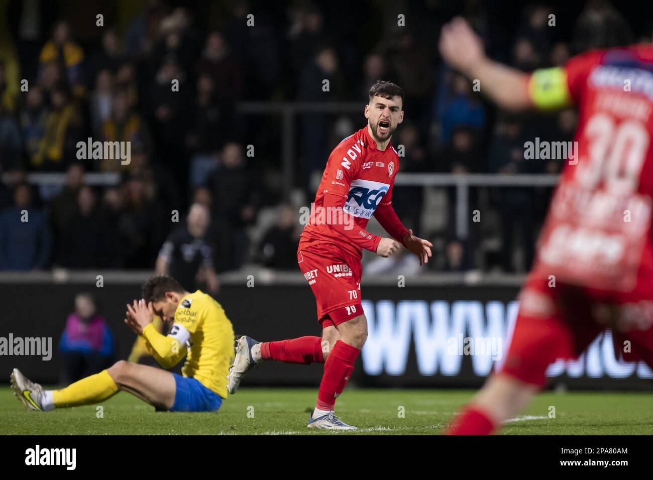 Kortrijk's Massimo Bruno celebrates after scoring during a soccer match ...
