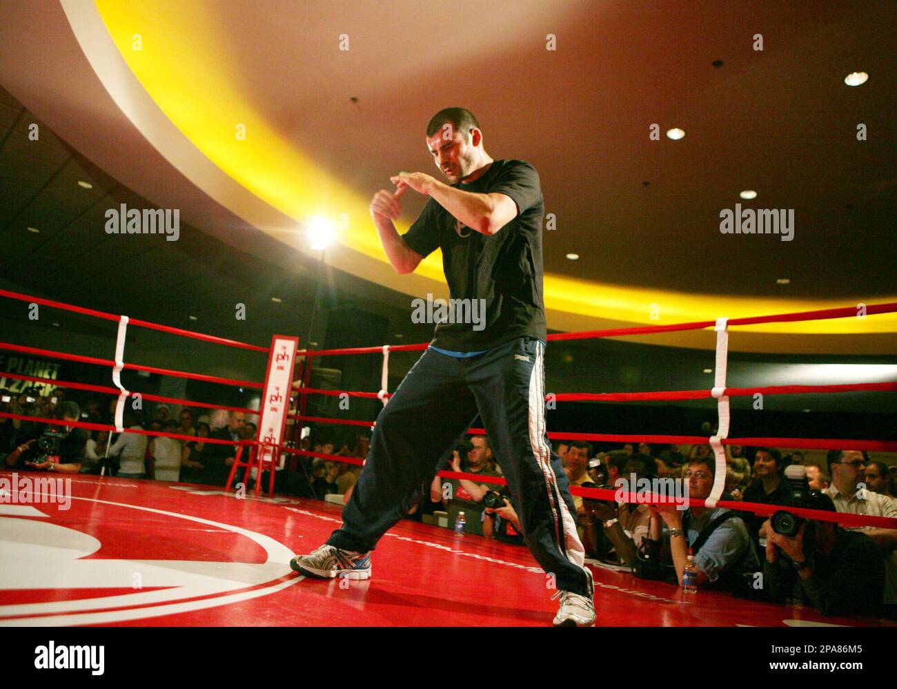 Joe Calzaghe, of Britain, trains during a media workout at Planet ...