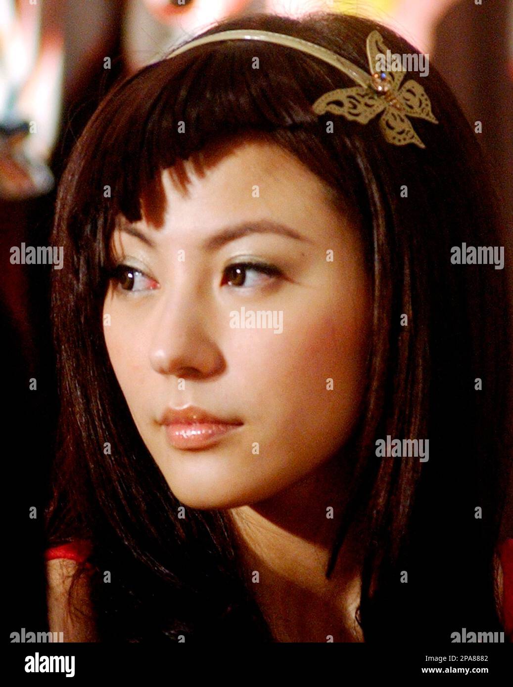 Taiwanese actress Annie Liu poses for photographers in a fashion show ...