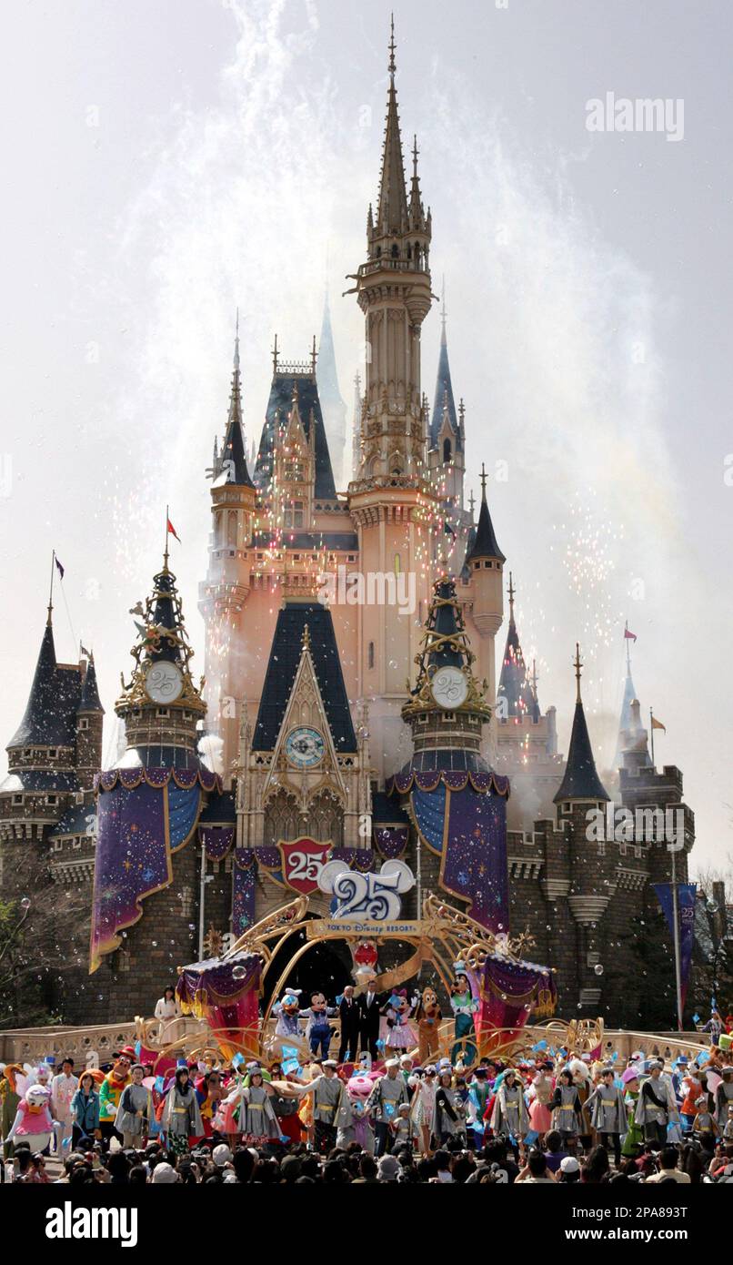 Fireworks explode in front of the Cinderella Castle during the ceremony ...